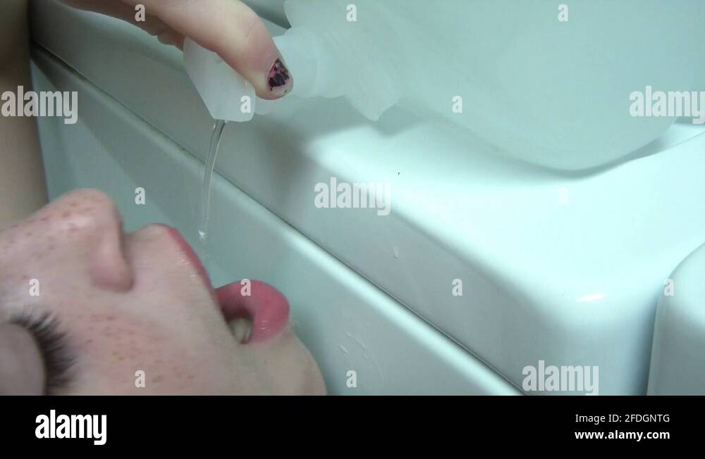 Pouring water into mouth Stock Videos & Footage - HD and 4K Video Clips ...