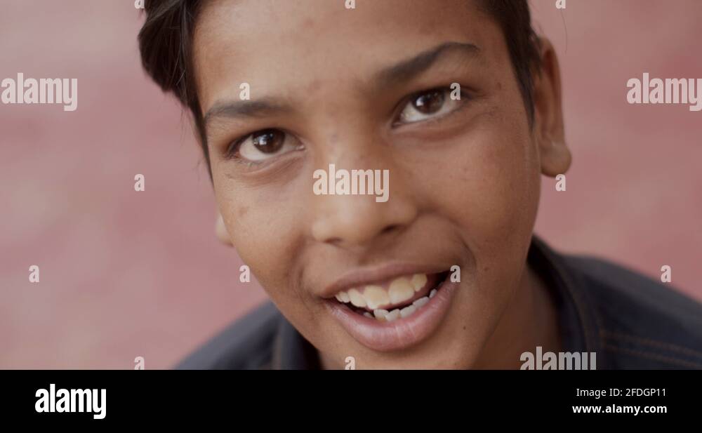 Group of Indian kids learning from practical experiments from teacher ...