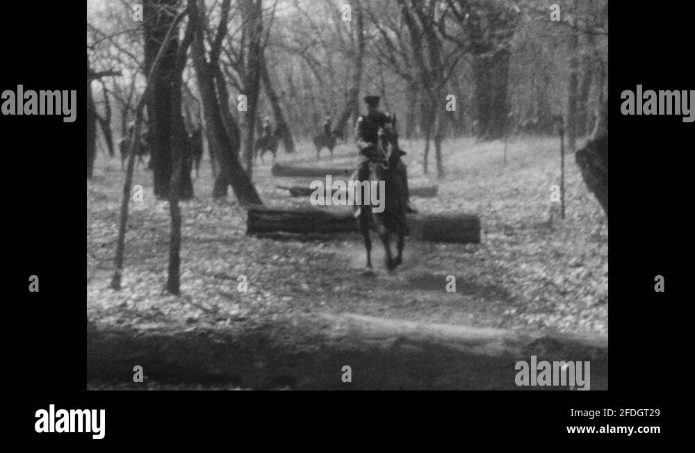 1920s: soldiers riding horses through woods, soldiers riding horses ...
