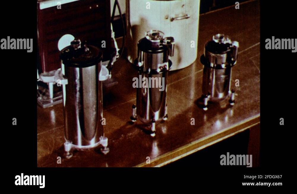 1960s: Three different sized cylinder measuring devices next to each ...