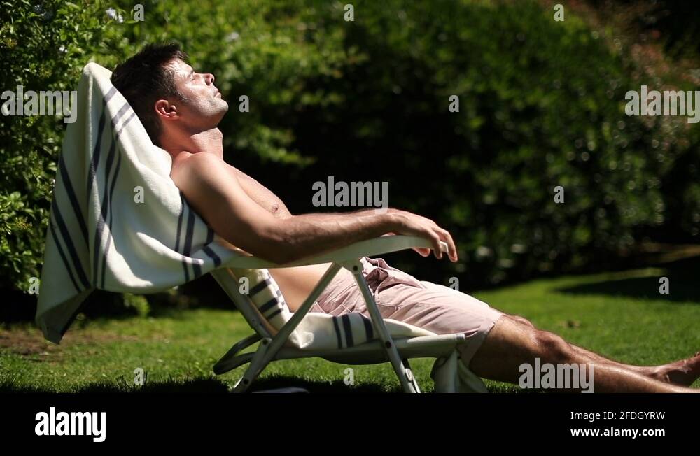 Man on grass sunbathing in park Stock Videos & Footage - HD and 4K ...