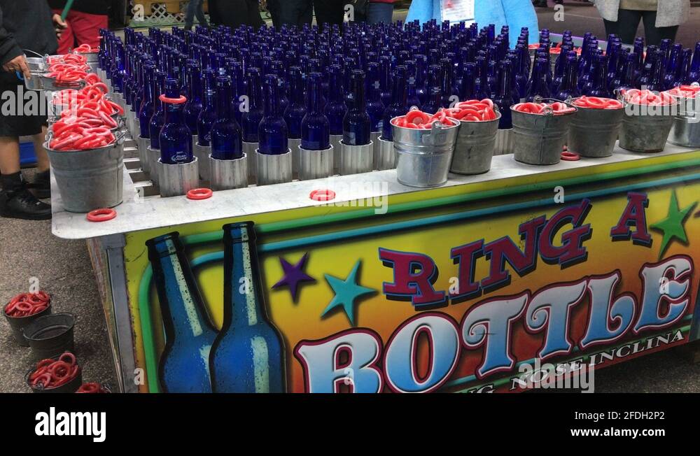 Ring throwing game Stock Videos & Footage - HD and 4K Video Clips - Alamy