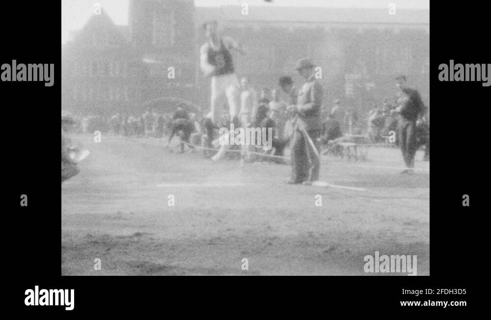 1920s: Man runs, does long jump, people watch. Man runs, does pole ...