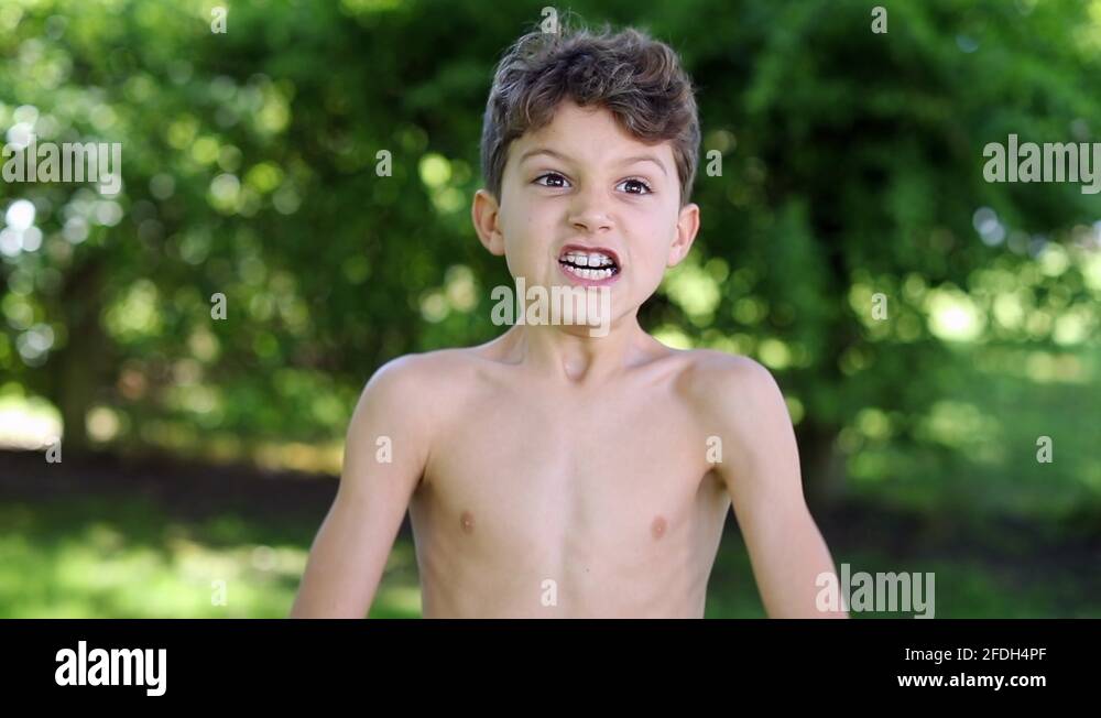Child screaming in slow-motion 120fps. Young boy yelling with open ...