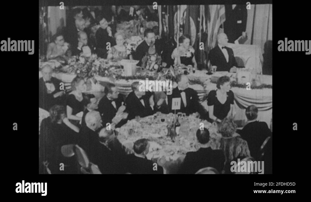 1940s: People sit at tables, clap. Truman makes a speech, people clap ...