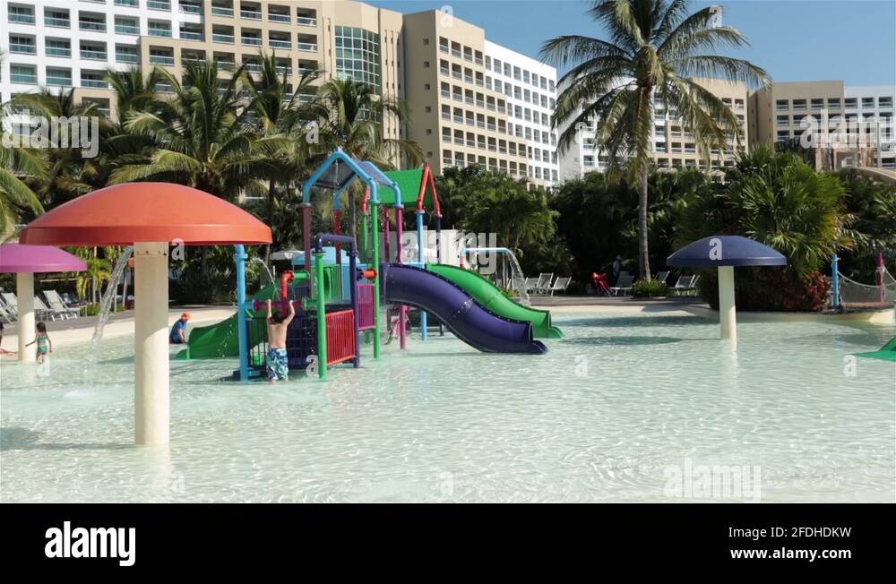 Kid swimming pool play slides luxury resort hotel HD 4478 Stock Video ...