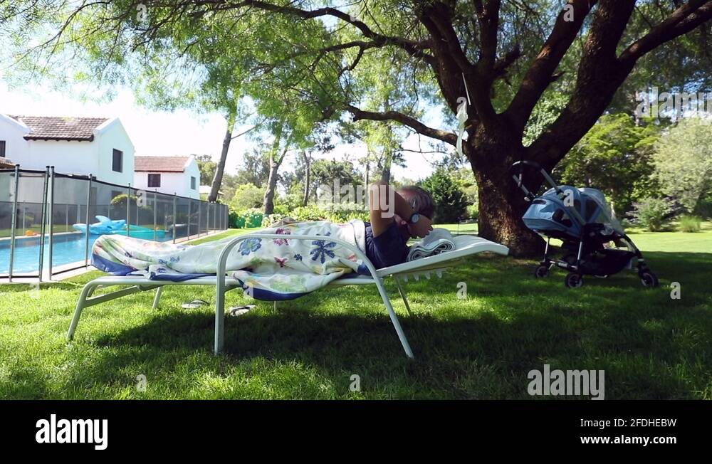 Man resting under tree Stock Videos & Footage - HD and 4K Video Clips ...