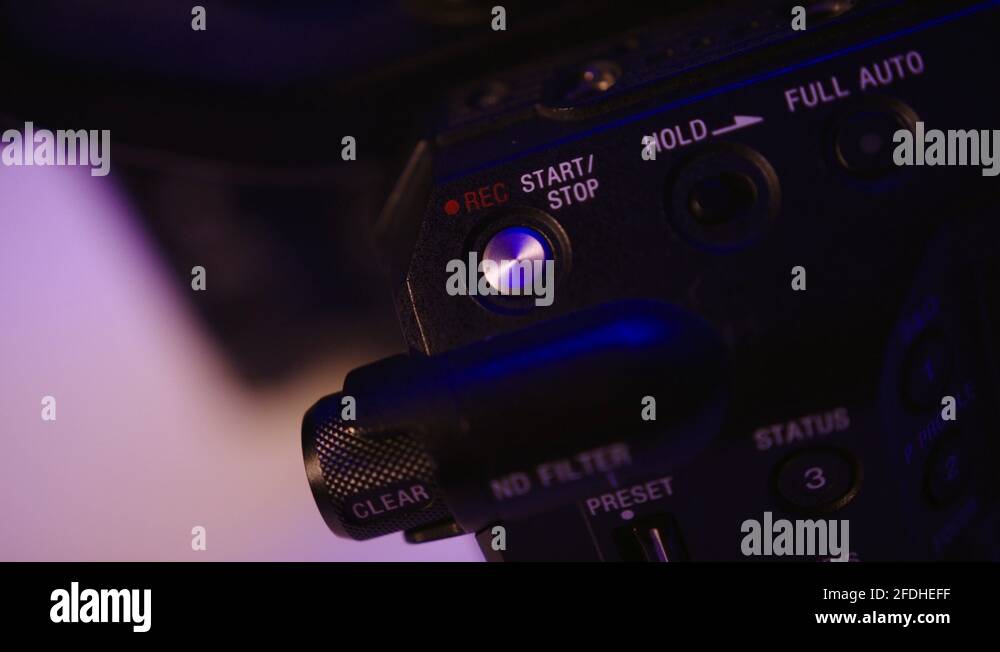 Sony camera: the top handle record button on an ENG video camera ...