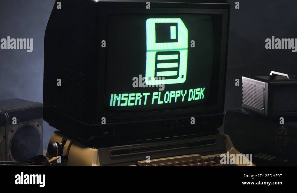 Insert Floppy Disk on a Old Retro Computer Monitor from 70s 80s Stock ...