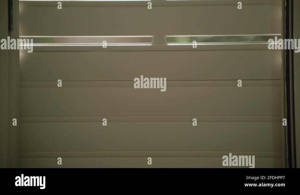 Electric / mechanical window shutters open and pull up Stock Video ...