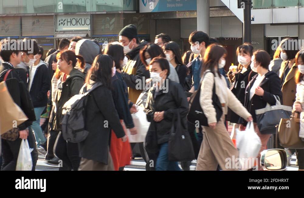 TOKYO, JAPAN : Crowd of people at the street. People wearing mask Stock ...