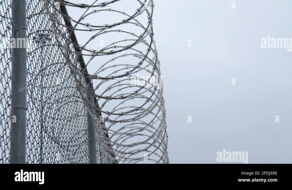 Razor wire and fence Stock Videos & Footage - HD and 4K Video Clips - Alamy