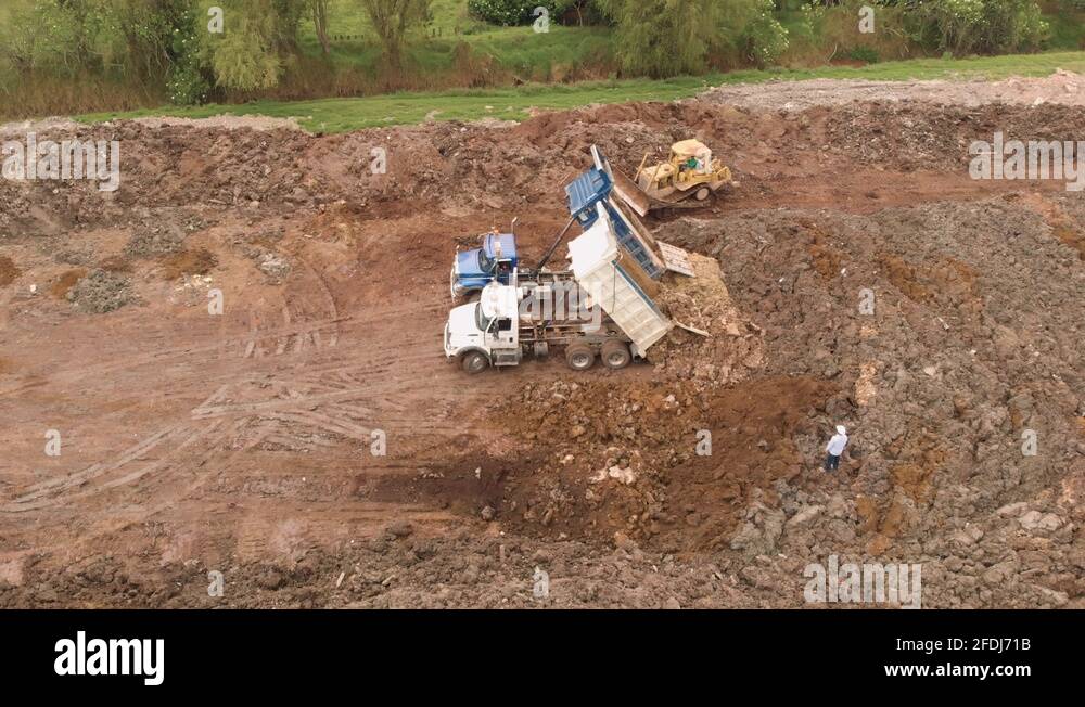 Dumping site trucks Stock Videos & Footage - HD and 4K Video Clips - Alamy