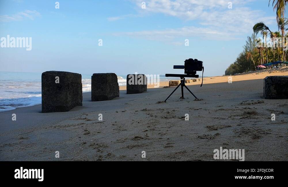 Camera on slider and tripod at tropical beach. Static shot Stock Video ...
