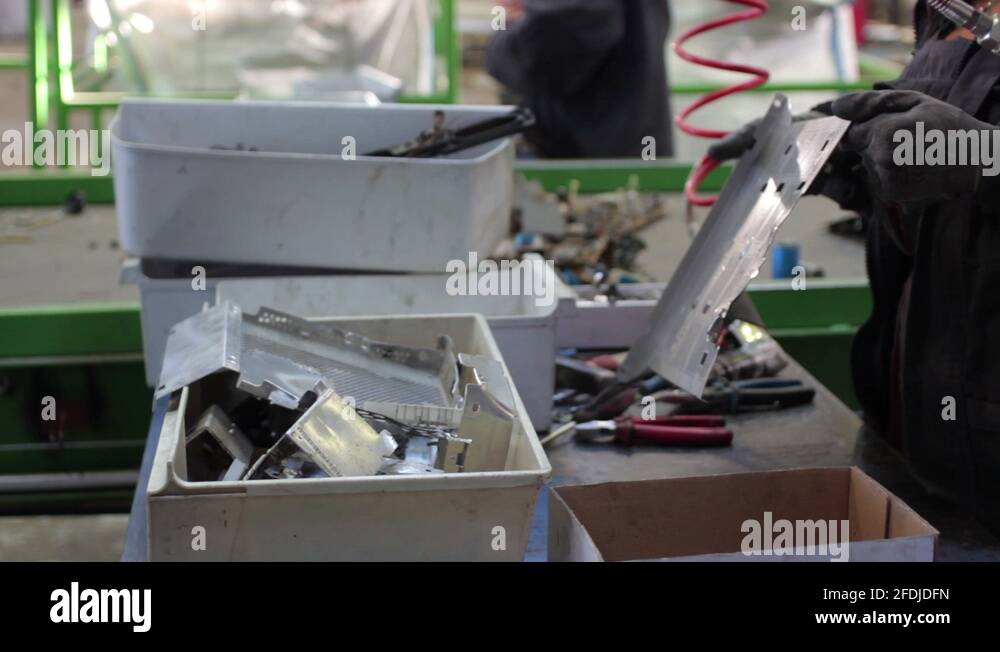 e-Waste recycling factory workers 2 Stock Video Footage - Alamy