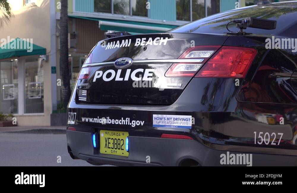 Miami beach patrol car with flashing lights on Ocean Drive 4k Stock ...