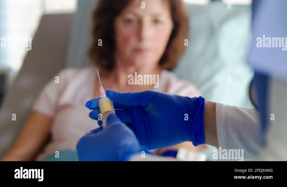 Nurse treating patient Stock Videos & Footage - HD and 4K Video Clips ...