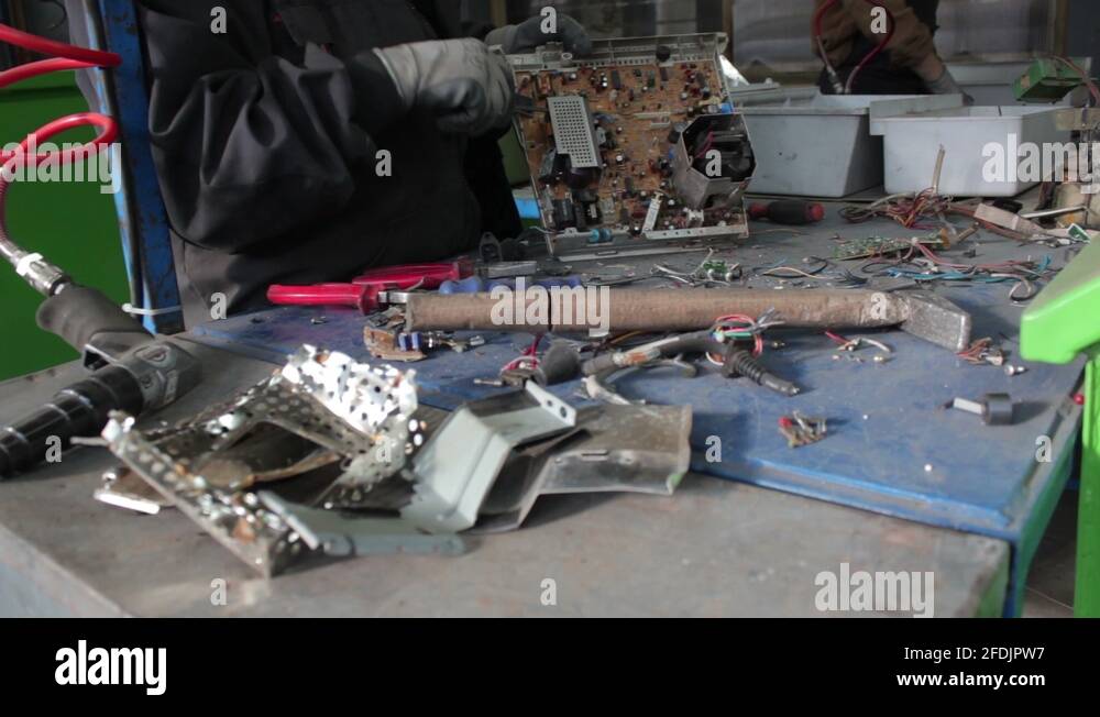 e-Waste recycling factory dismantling 2 Stock Video Footage - Alamy
