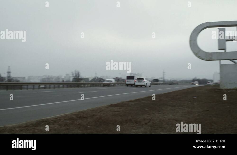 Chisinau Moldova City Sign reveal pan right with traffic Stock Video ...