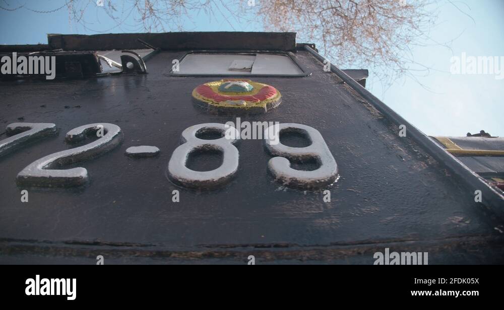 Serial Number on the side of the old black steam locomotive train with ...