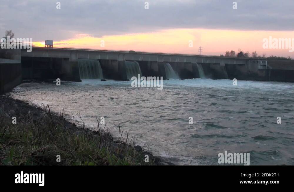 Water passes through a bridge which creates waterfalls Stock Video ...