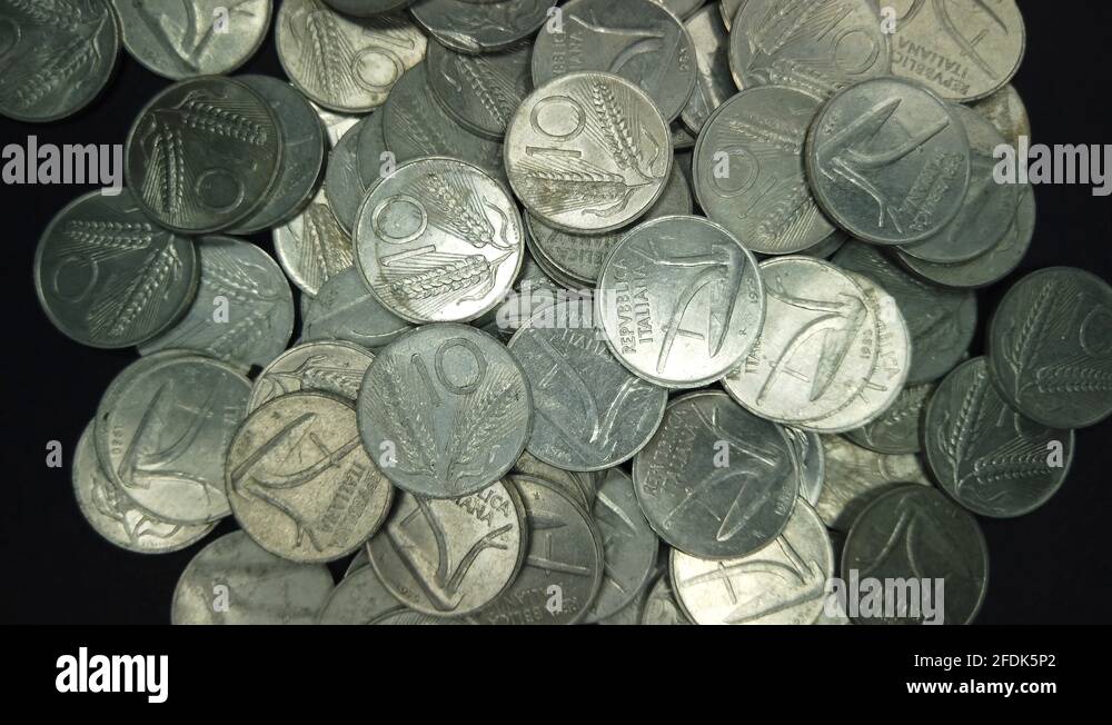 Italian old currency ten Lire top view rotation of aged coins Stock ...