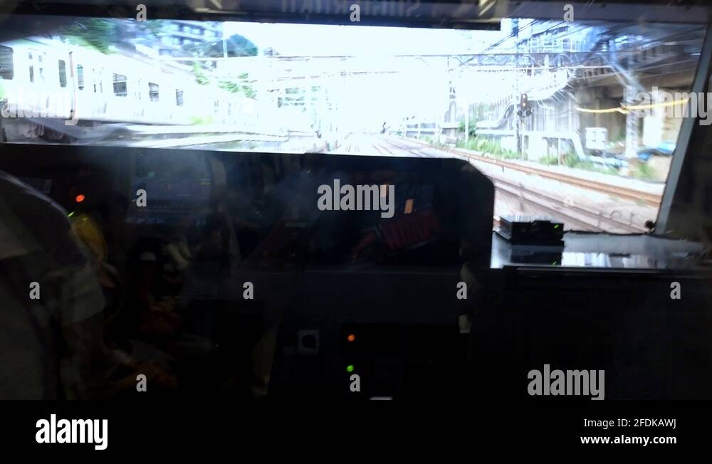 Cockpit of Metro C Line passing street traffic bridges with a second ...