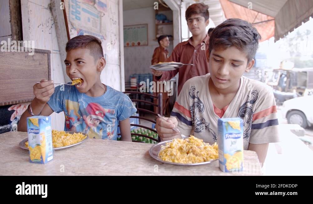 Poor kids eating Stock Videos & Footage - HD and 4K Video Clips - Alamy