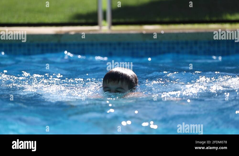 Child pretending to be drowning at the swimming pool Stock Video ...