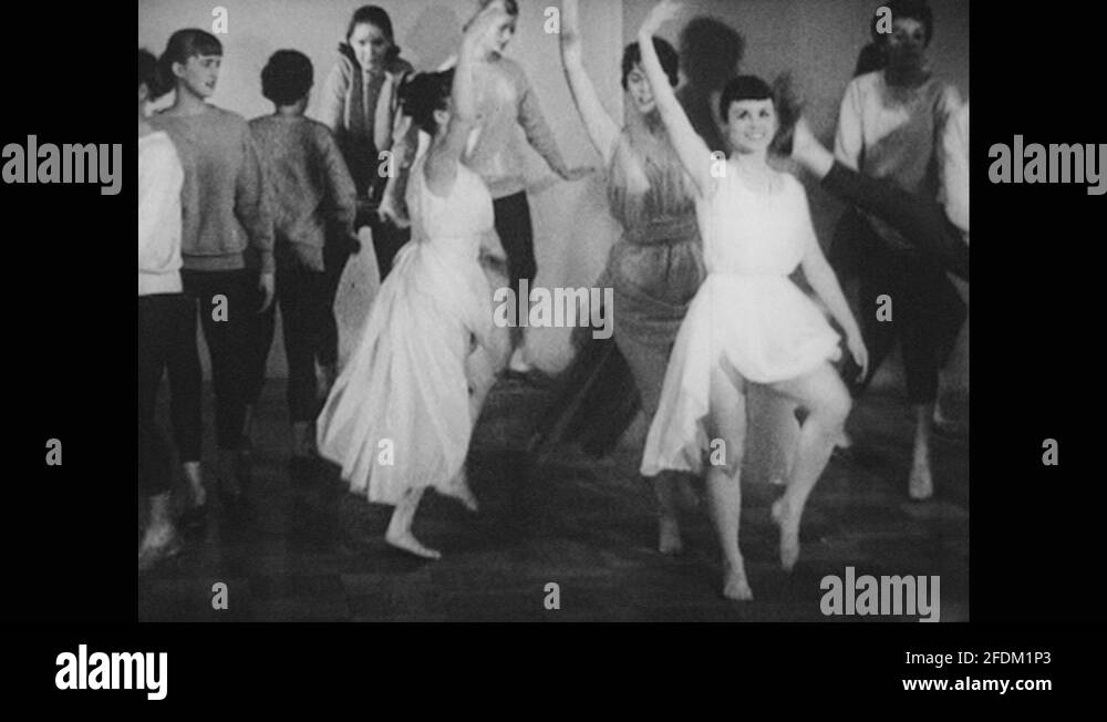 1950s: Girls dancing in studio. Dancers enter, group of girls dancing ...