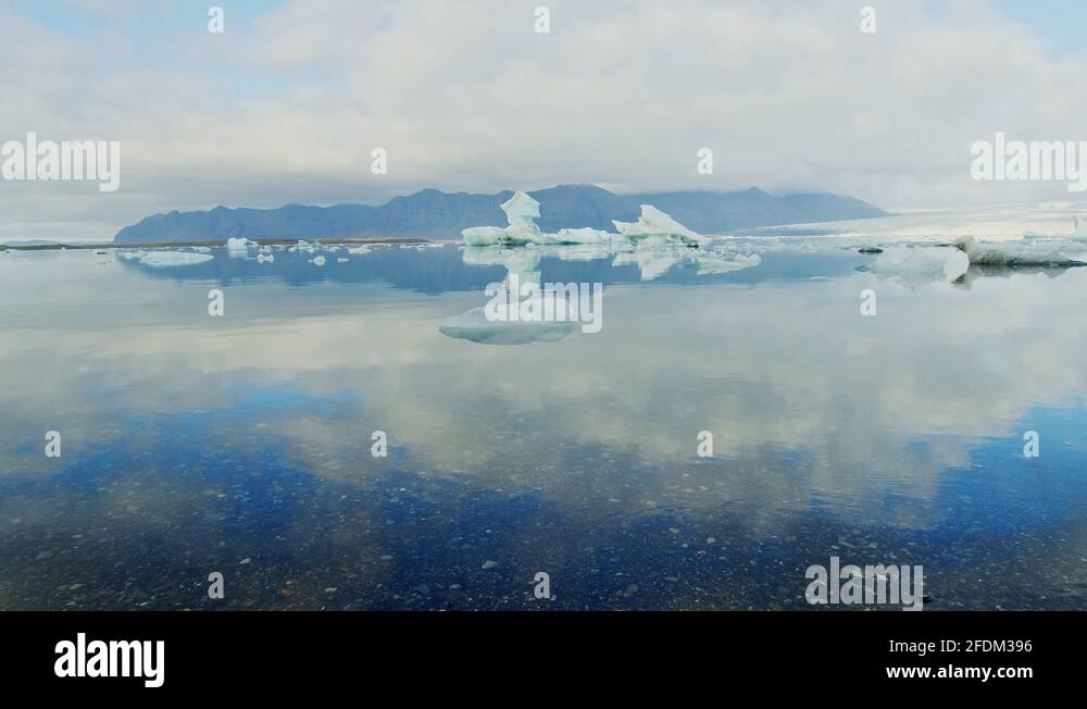 A Stunning Reflection of Beautiful Nature in an Icy Land of Iceland ...
