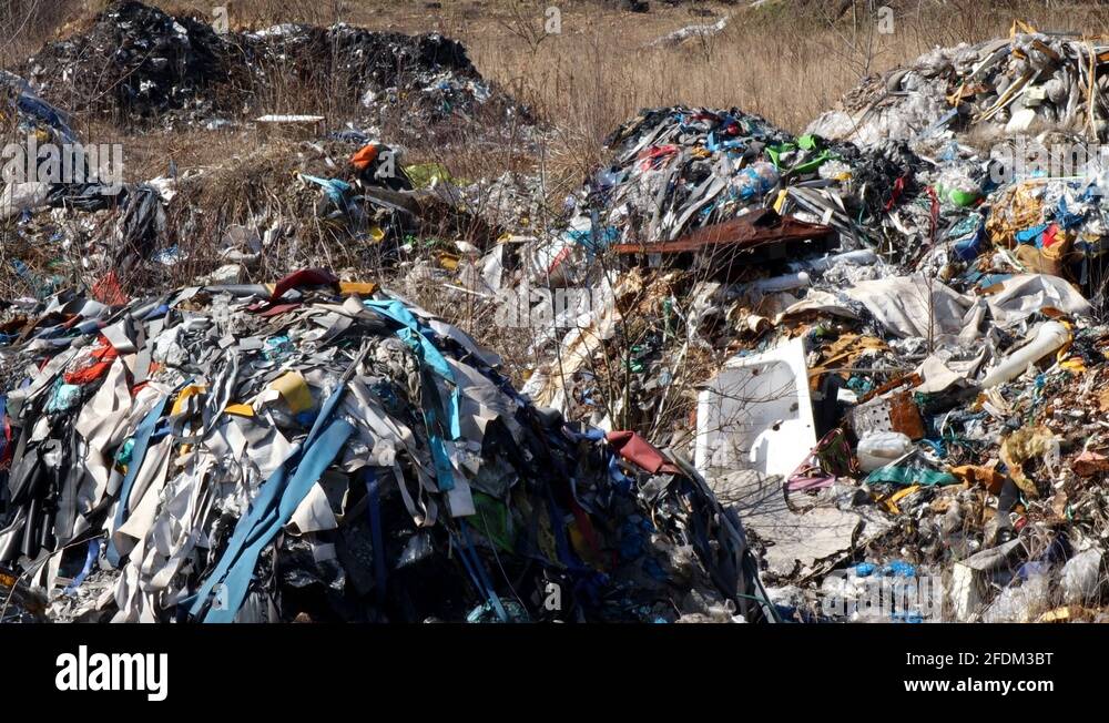 Household waste dumped in the countryside, polluted environment Stock ...