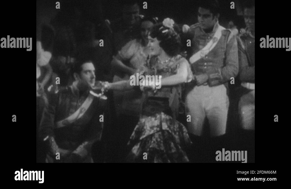 1940s: Carmen dances on the stage singing the Habanera aria around a ...