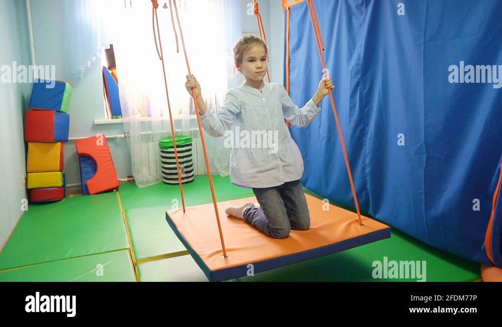 little girl on Platform sensory integration Stock Video Footage - Alamy