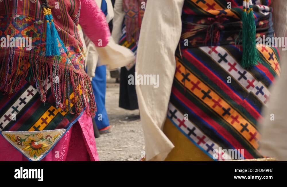 Female buddhist dancing in traditional clothes at the inauguration of ...