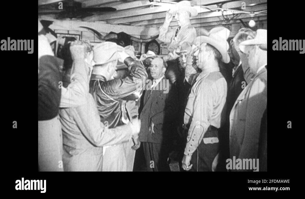 1940s: men take off cowboy hats and sing together, cow head with horns ...
