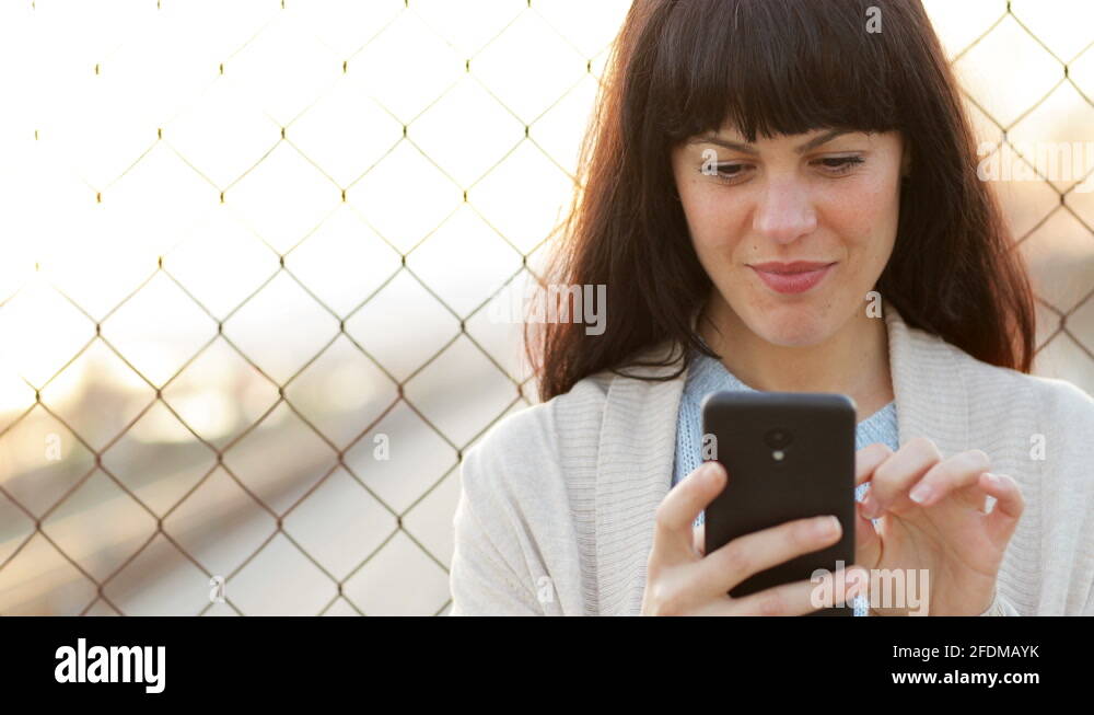 Smartphone mobile cell phone using reading texting checking looking app ... Smartphone mobile cell phone using reading texting checking looking app ...