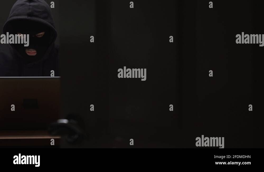 Hacker man mask typing on Stock Videos & Footage - HD and 4K Video ...