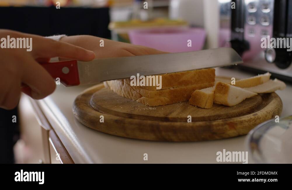 Cutting crusts Stock Videos & Footage - HD and 4K Video Clips - Alamy