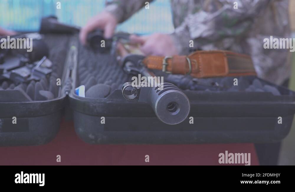 sniper rifle in a case and sniper hands Stock Video Footage - Alamy