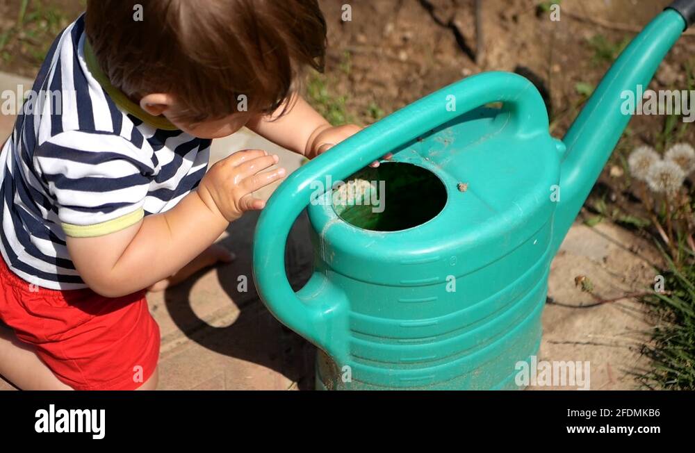 The kid is exploring the world. Cute boy creeps. Cute little boy in the ...