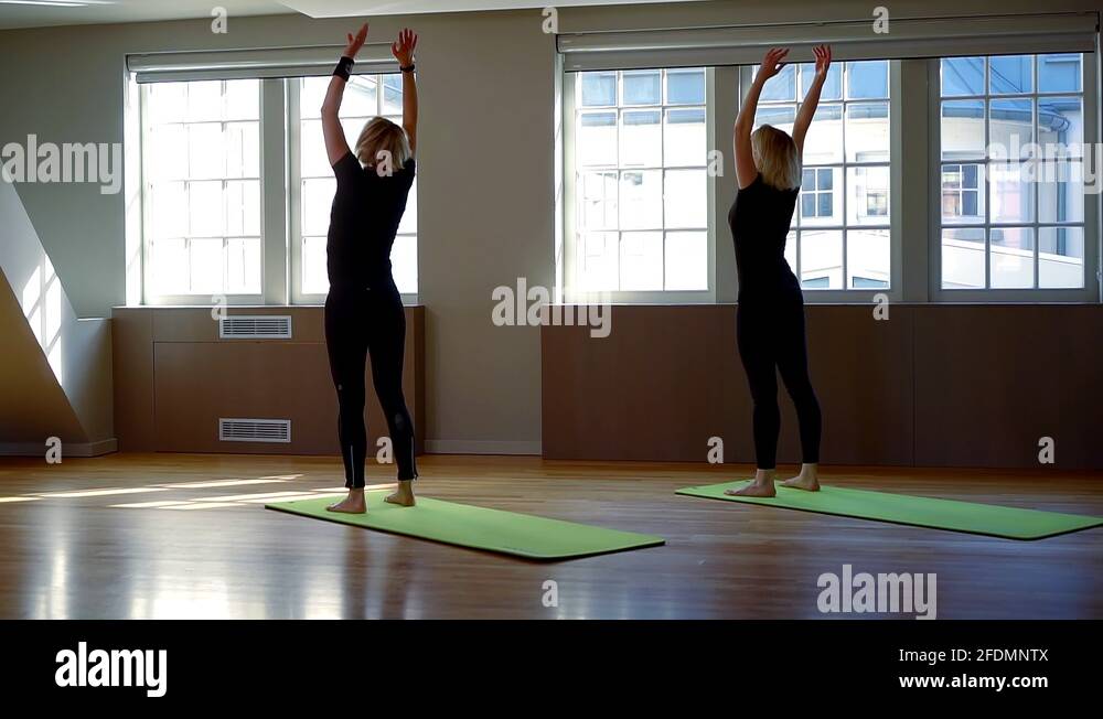 Slender athletes stretching exercises Stock Videos & Footage - HD and ...