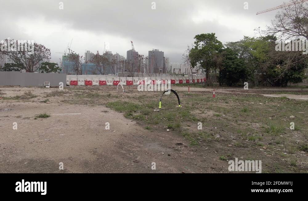 Racing Drone practice gate passes with Hong Kong skyline in the horizon ...
