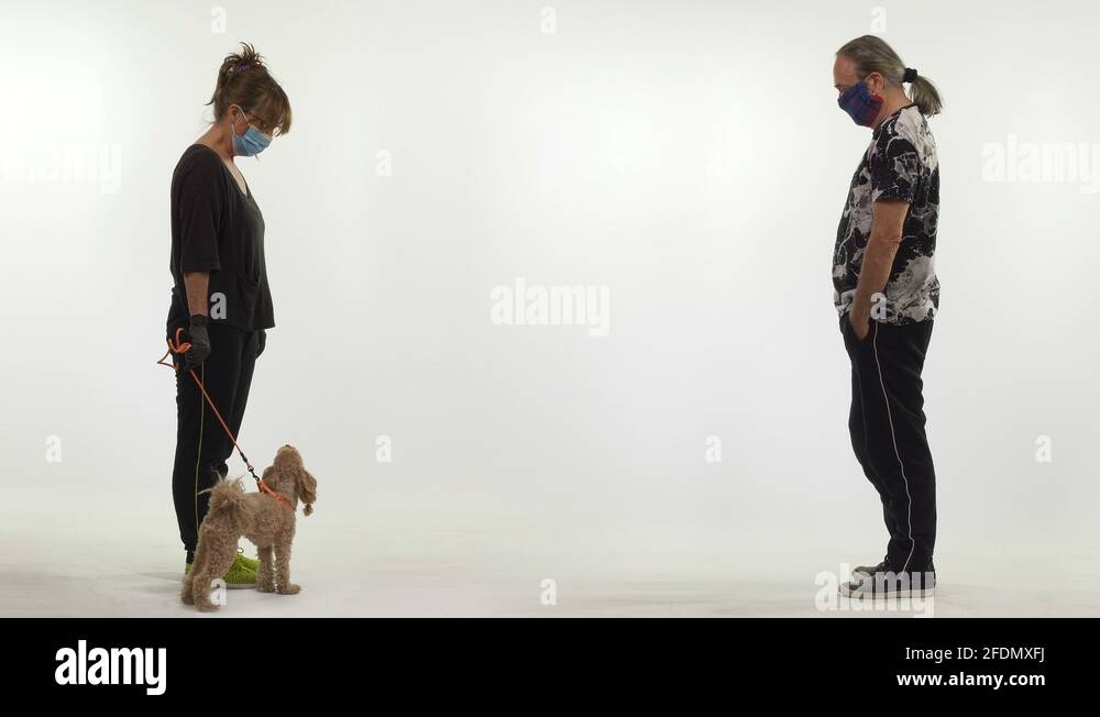 People keep a distance of six feet or two meters from each others Stock ...