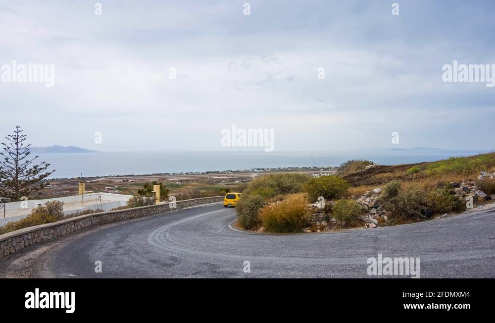 A Clean Road with Plants on the Sideroad Under the Cloudy Weather at ...
