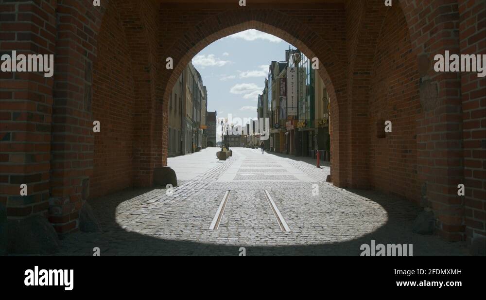 Person Walking Down The Empty Street. Wide Shot Old Town Stock Video ...