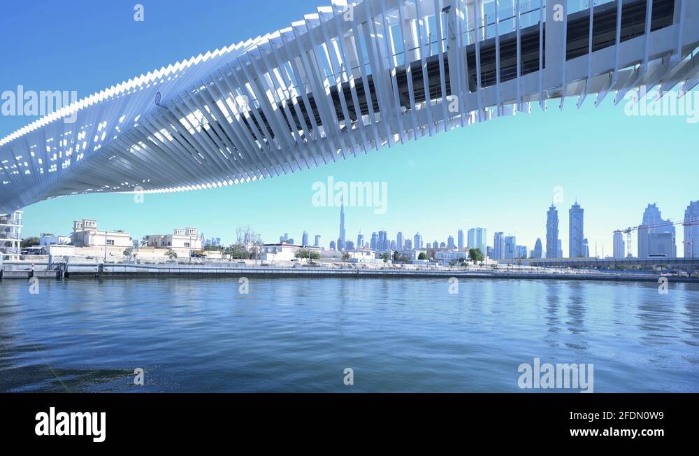 Twisted Bridge. Structure of architecture with lake or river, Dubai ...