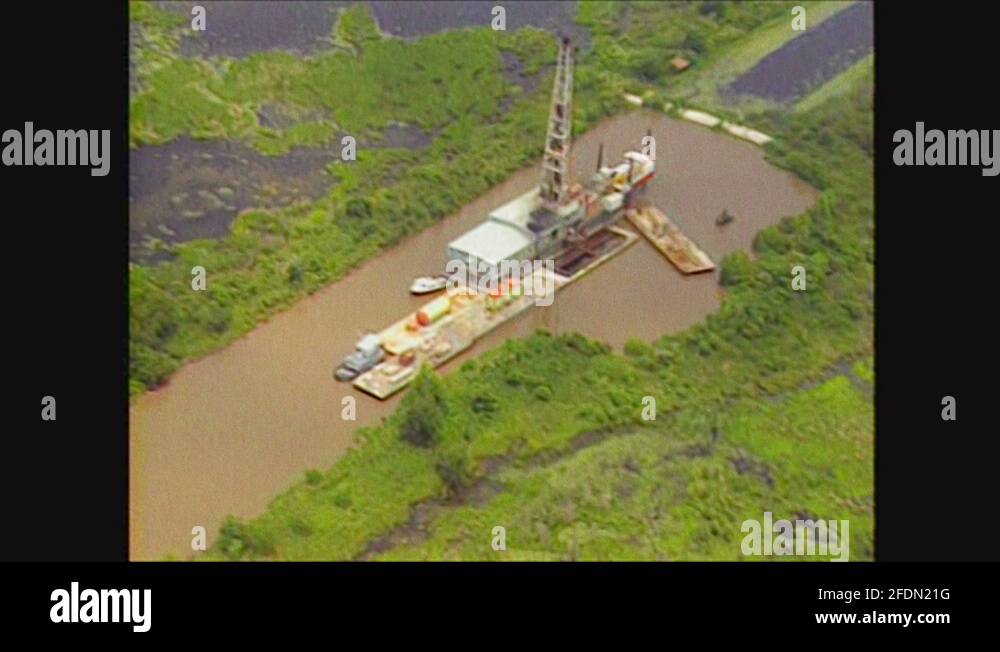 2000s: large rig in river in wetlands, different farming machines and ...