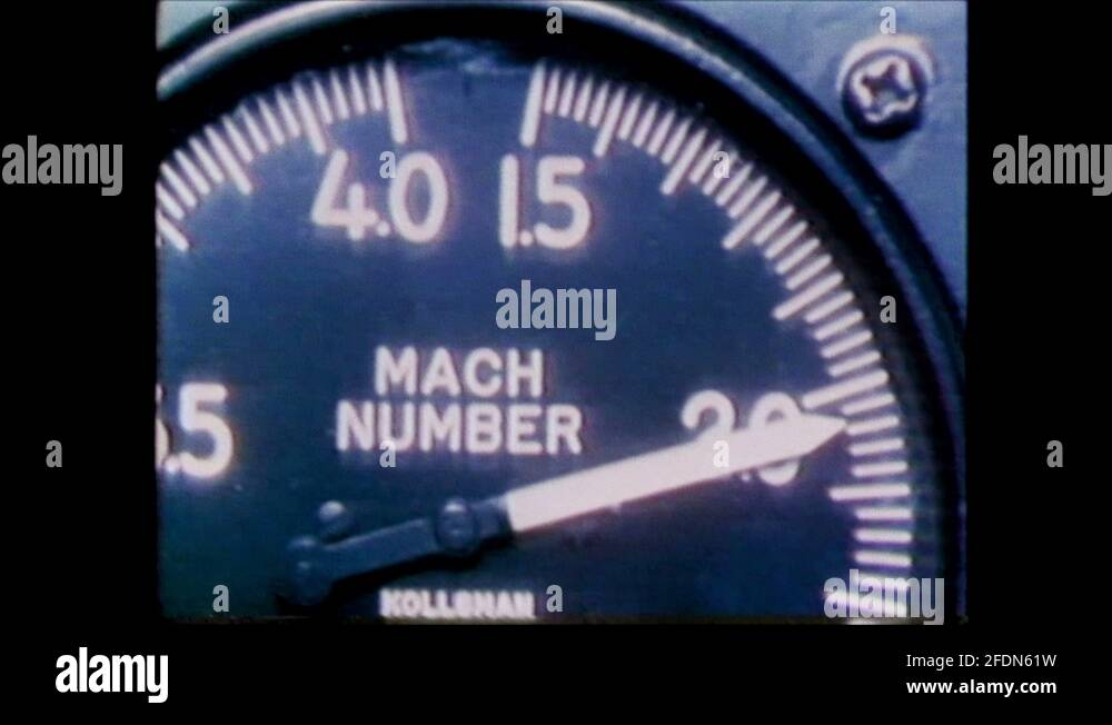 1980s: MACH number dial at maximum in cockpit. Fighter jet pilot in ...