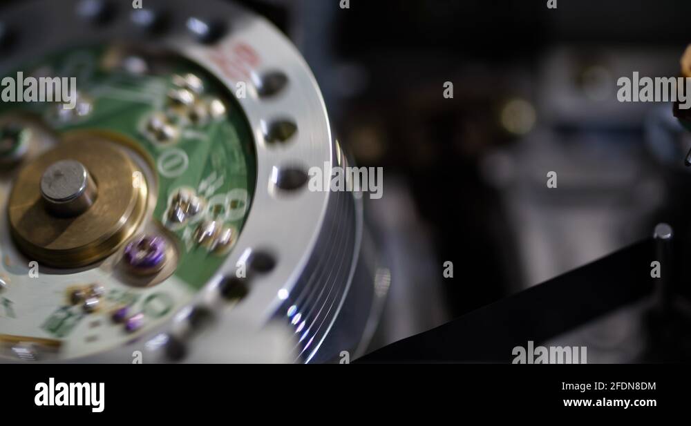 Tight close-up shot of an interior of a vintage VHS tape recorder ...